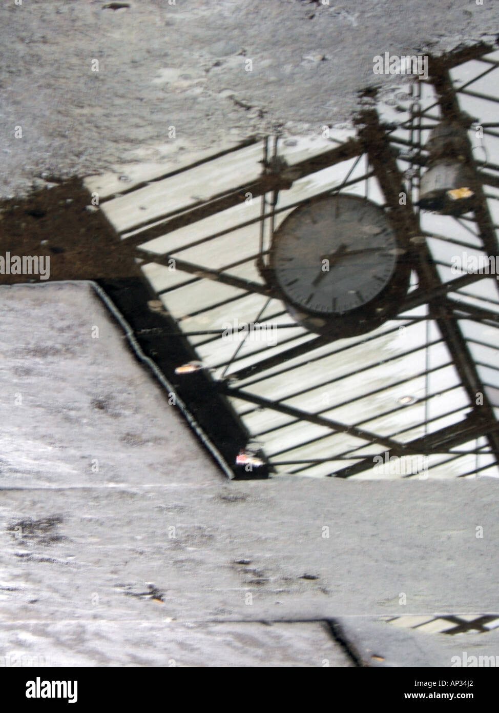 train platform clock in rain Stock Photo - Alamy