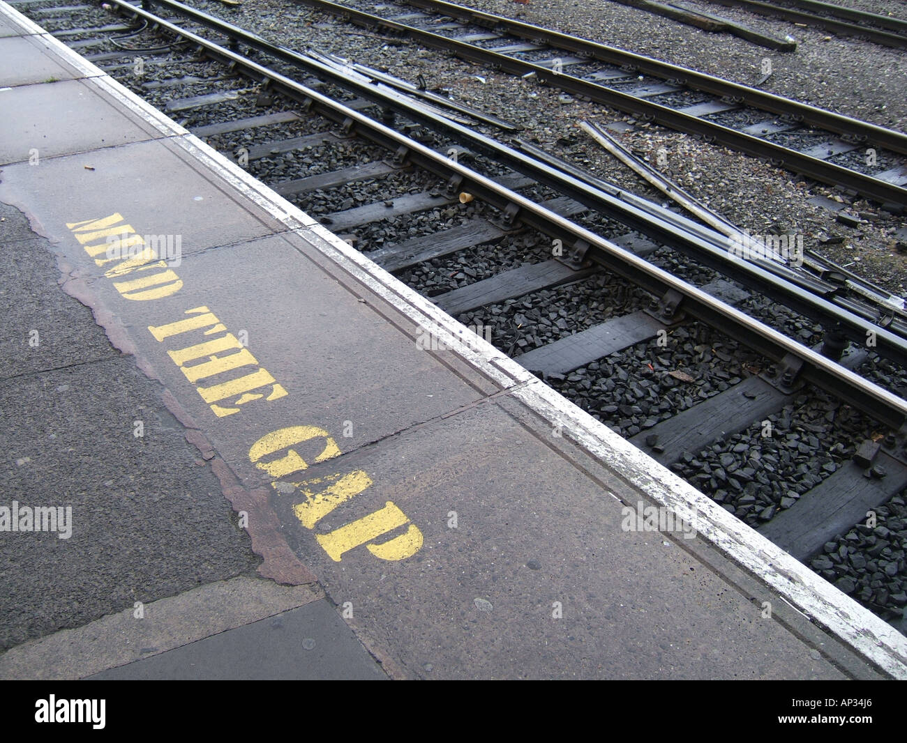 mind the gap words on station platform Stock Photo - Alamy
