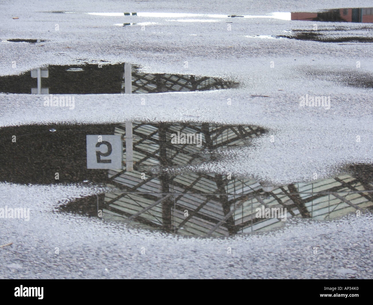 train platform number five in rain Stock Photo - Alamy