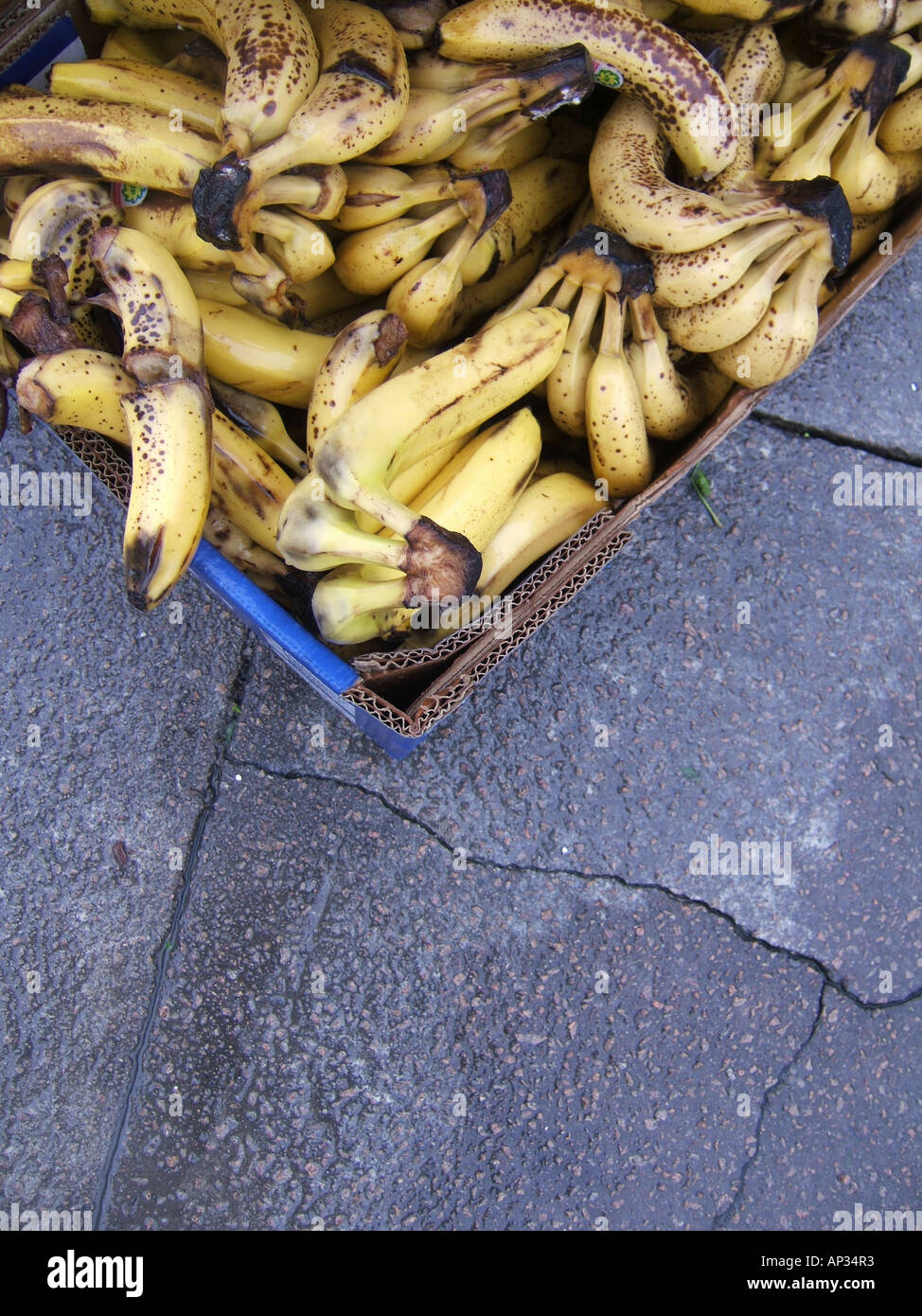 a case of rotten bananas on market stall Stock Photo - Alamy