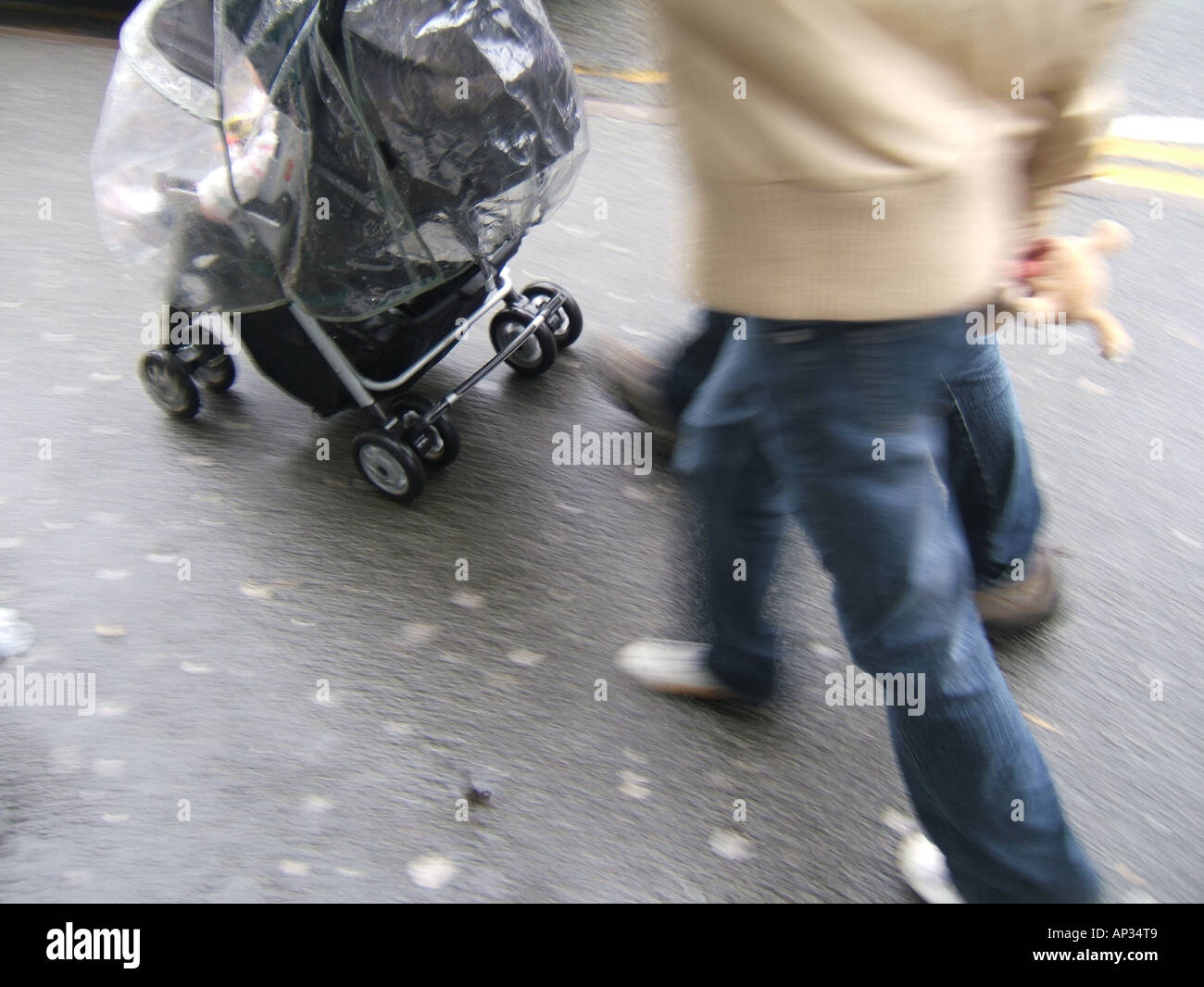 woman pushing pram Stock Photo - Alamy