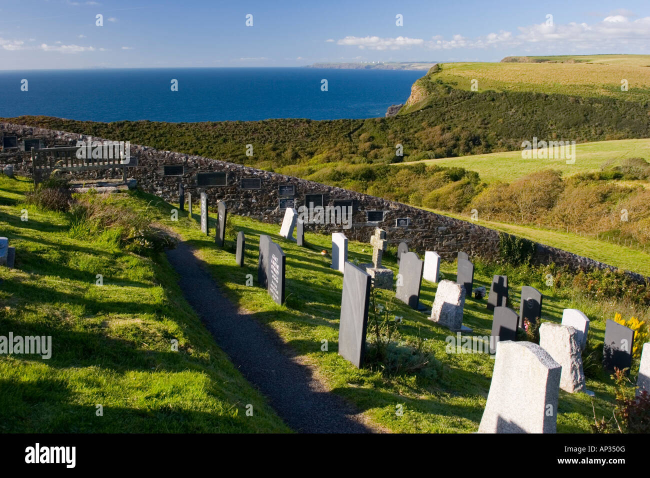 The graveyard at the church of St Gennys with panoramic view along the ...