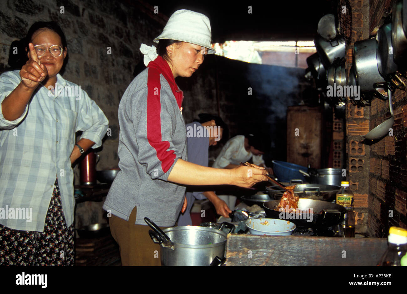 Vietnamese women cooking in the kitchen, Dalat, Vietnam Stock Photo - Alamy