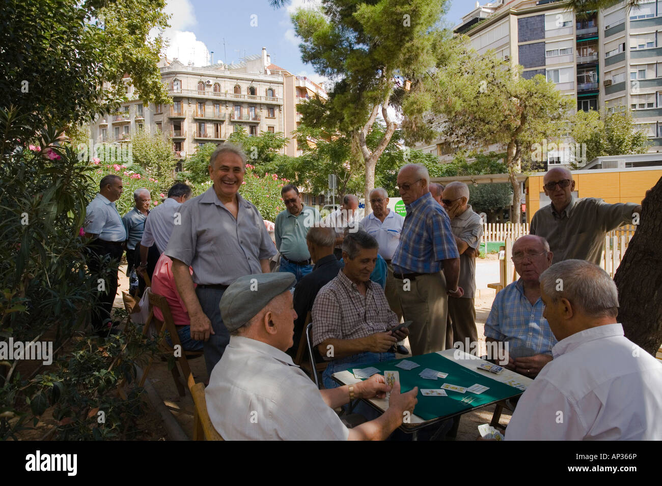 card game, Placa Gaudi, Eixample, Barcelona, Spain Stock Photo - Alamy