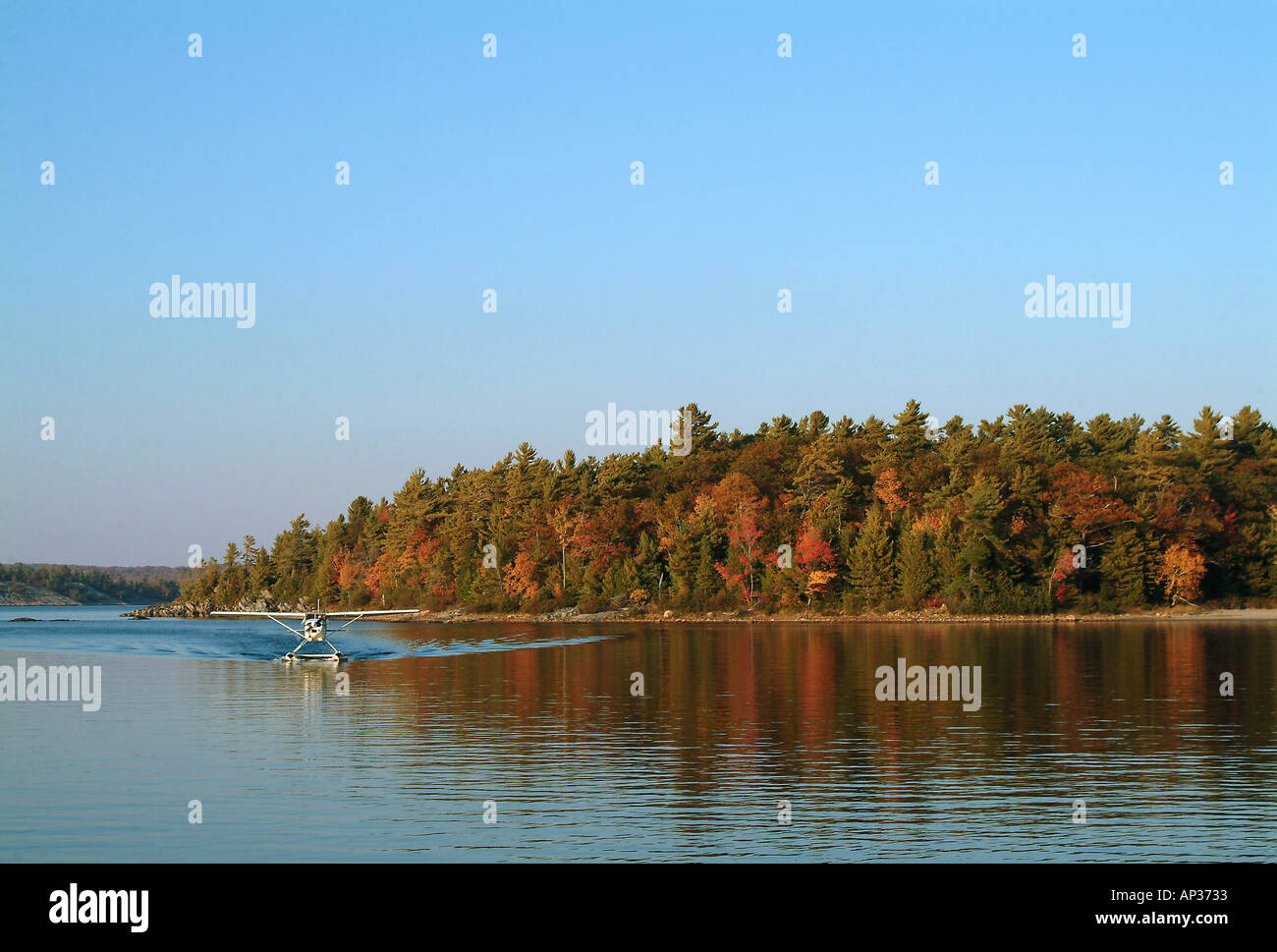 Forest lake float plane flying hi-res stock photography and images - Alamy