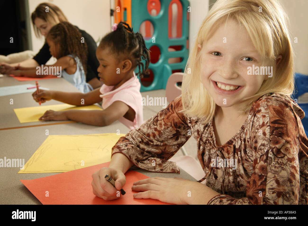 Girl colors a picture Stock Photo - Alamy