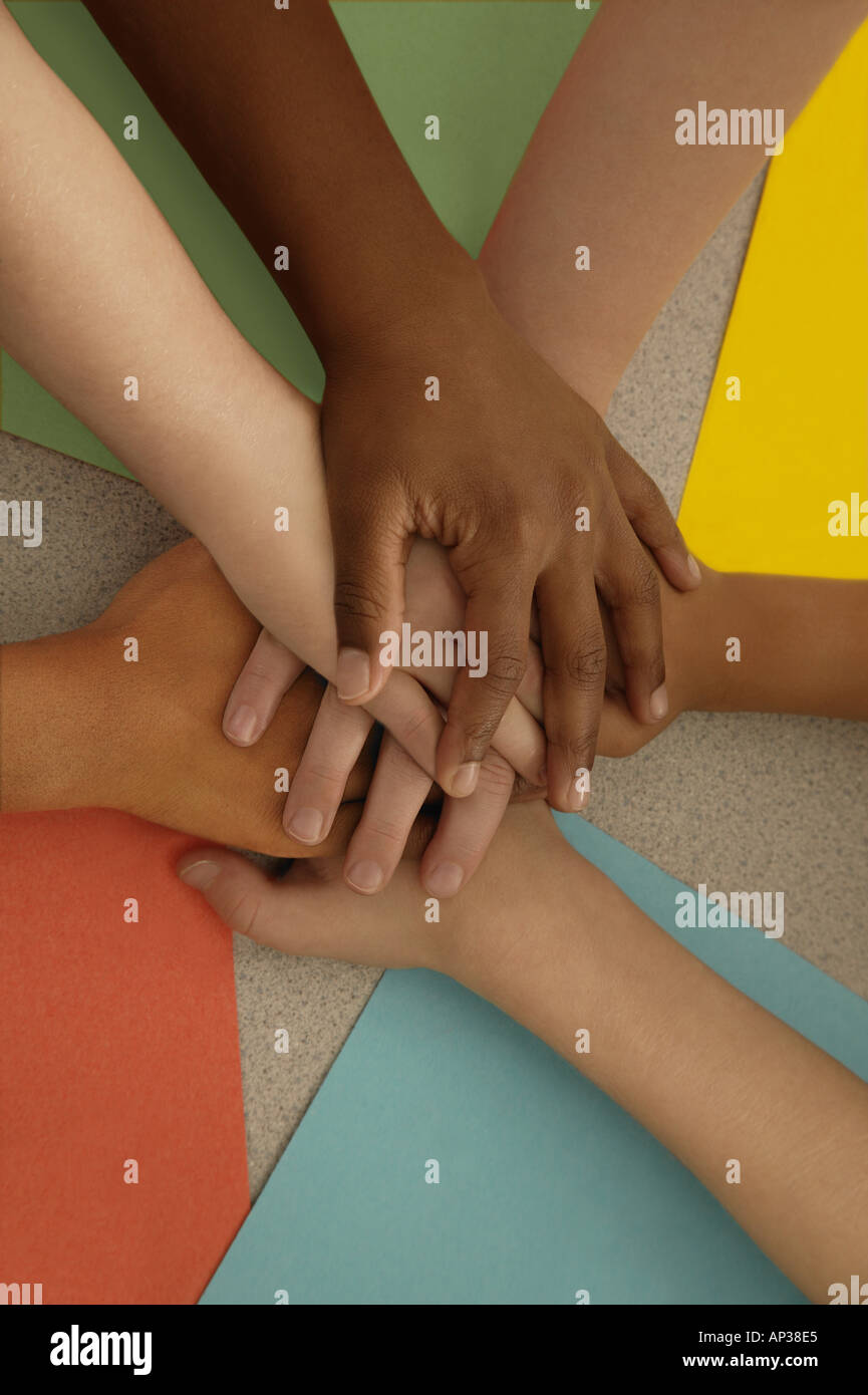 Children put their hands together Stock Photo - Alamy