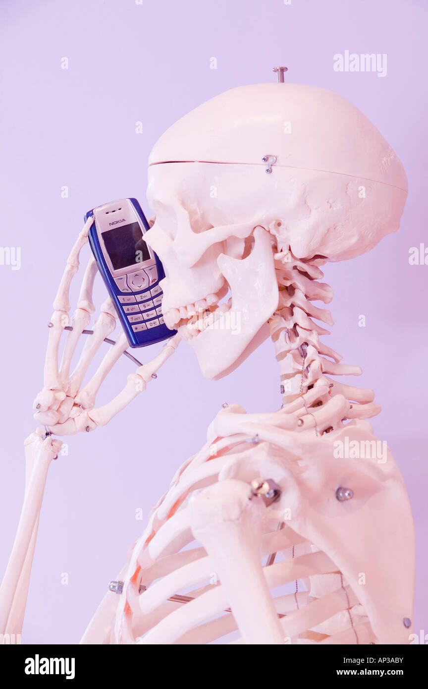 A human skeleton talking on a mobile phone Stock Photo - Alamy