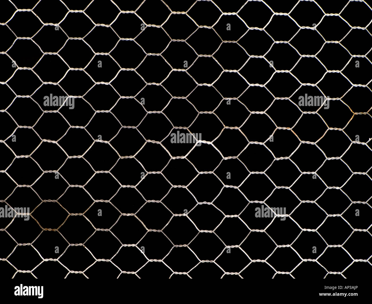 Old, rusty metal net isolated on black Stock Photo - Alamy
