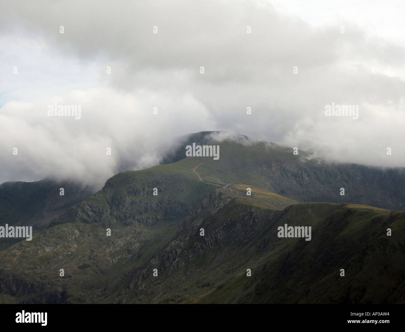 mount snowdon covered with cloud in north wales uk Stock Photo - Alamy