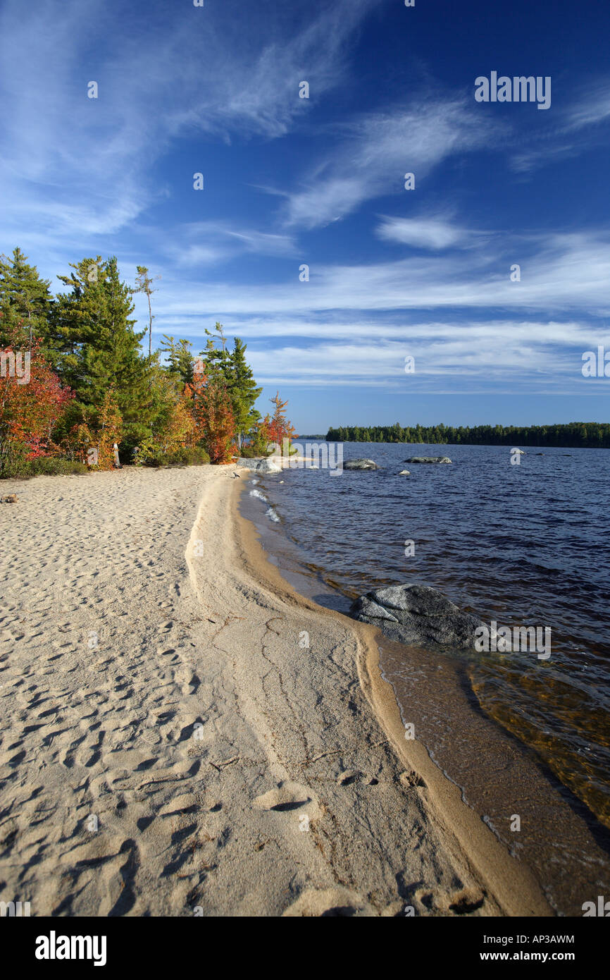 A beach at Lake Millinocket in autumn, Maine, USA Stock Photo - Alamy