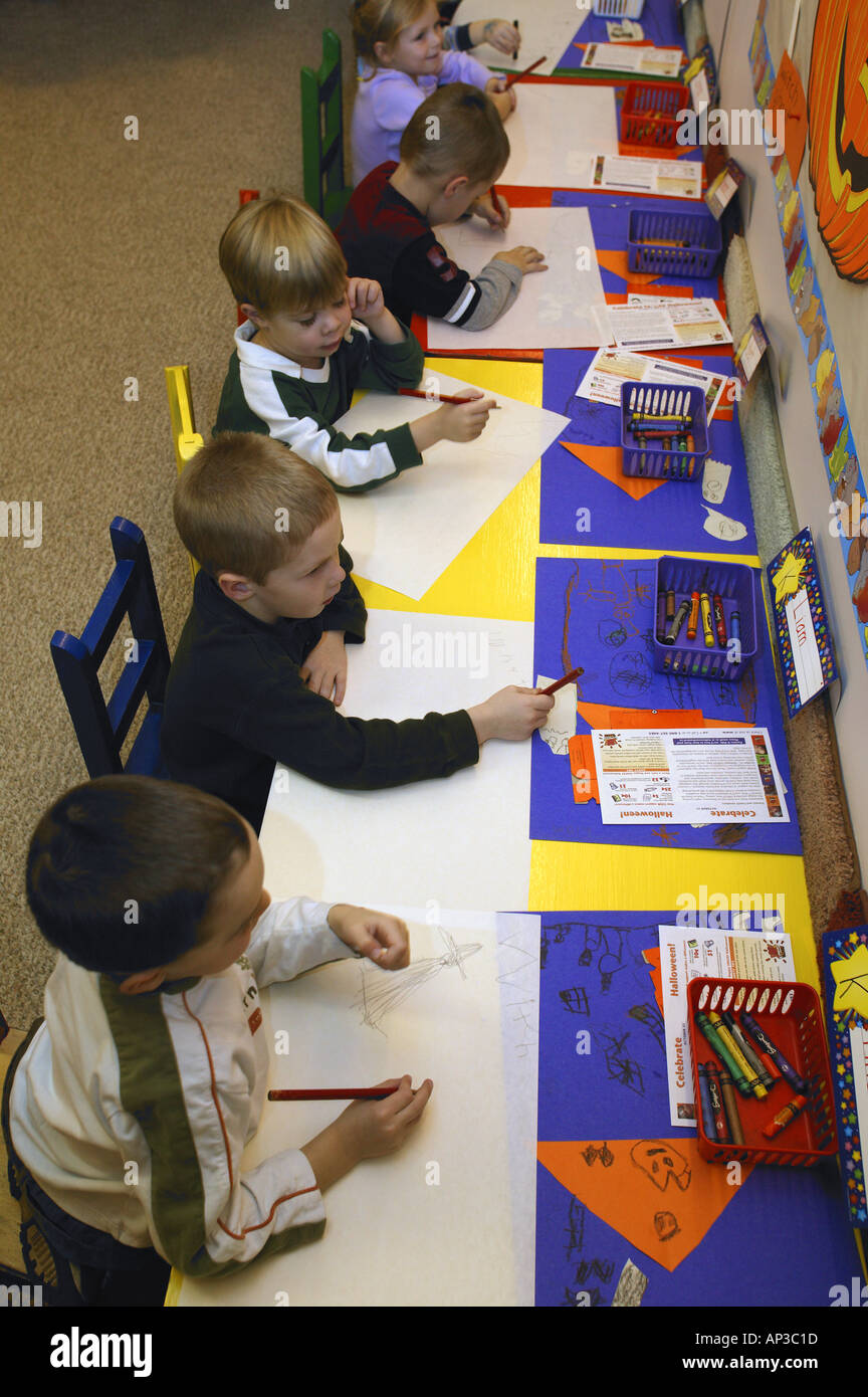 Children drawing and socializing at school Stock Photo - Alamy