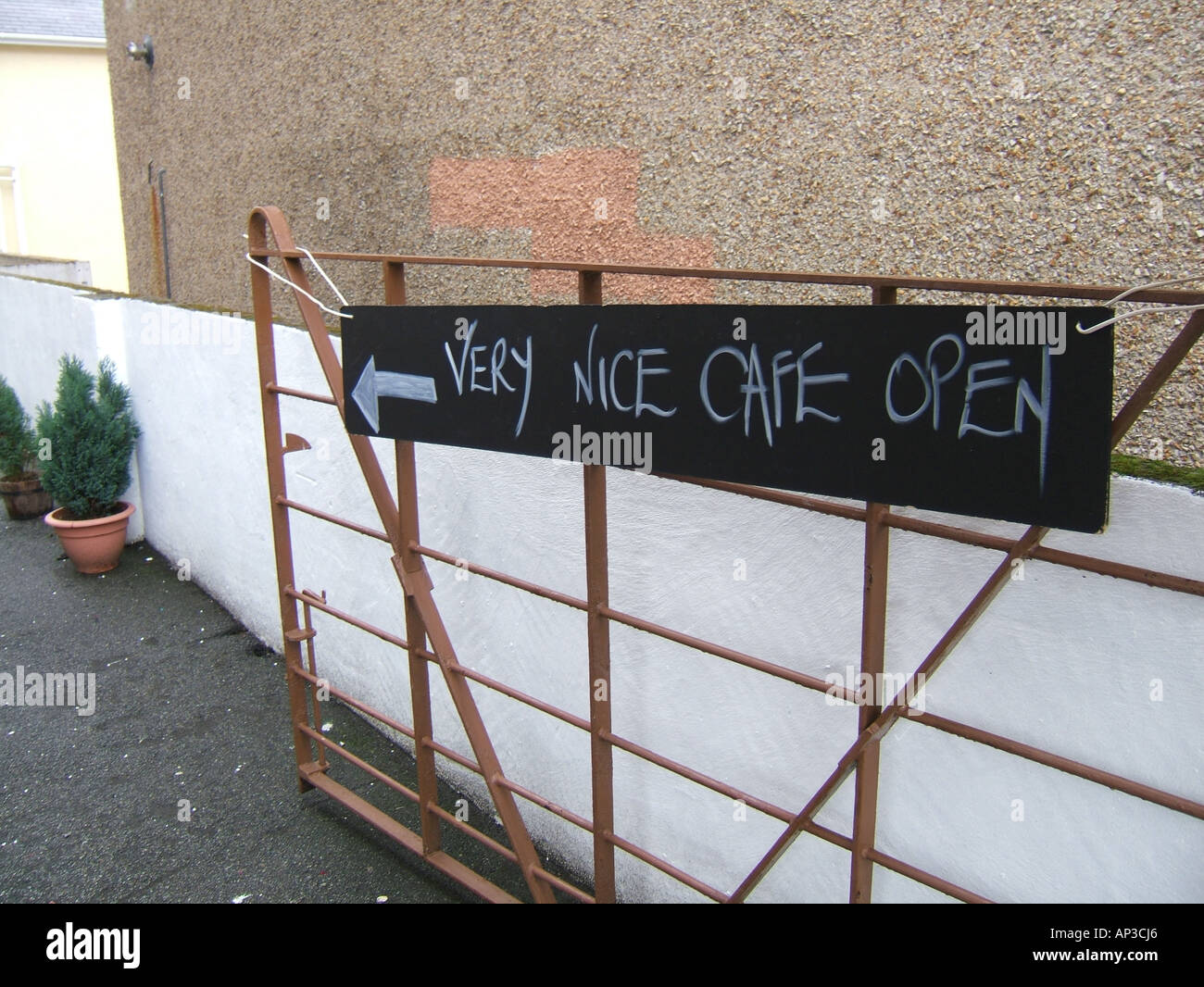 very nice cafe open sign on gate Stock Photo - Alamy