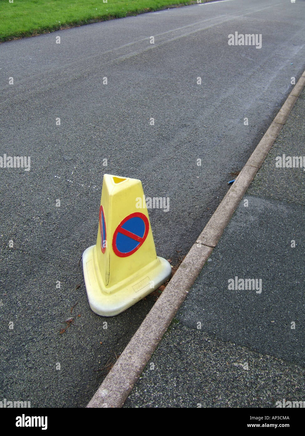 one cone on street Stock Photo - Alamy
