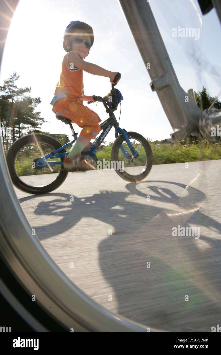 Back view children riding bicycle hi-res stock photography and images ...