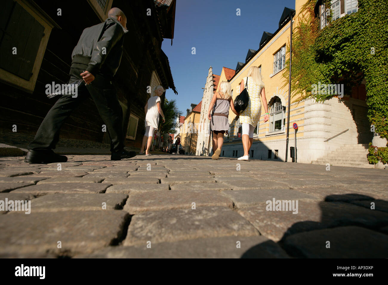 People walking through the old town, Visby, Gotland, Sweden Stock Photo ...