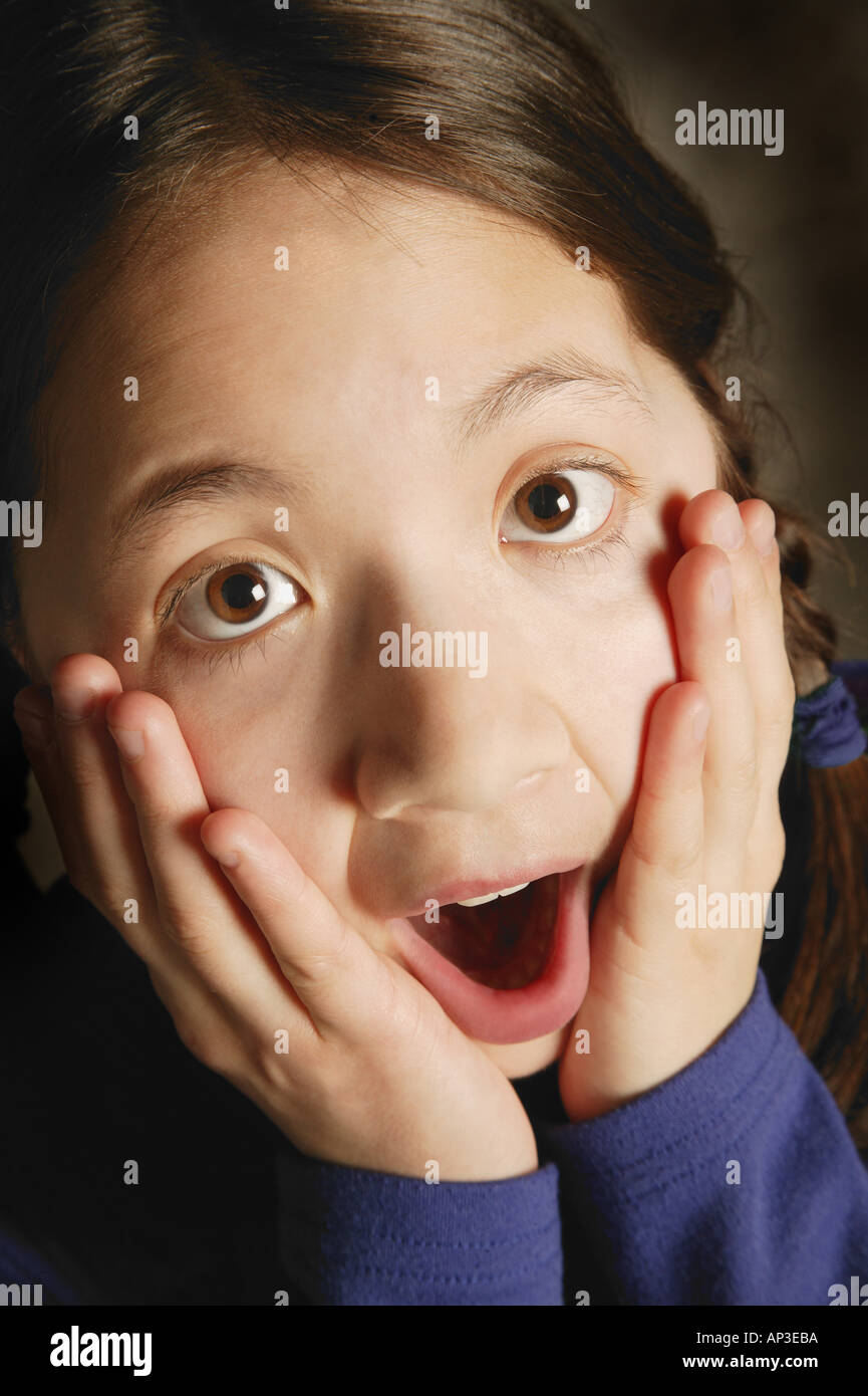 Girl looking surprised Stock Photo - Alamy