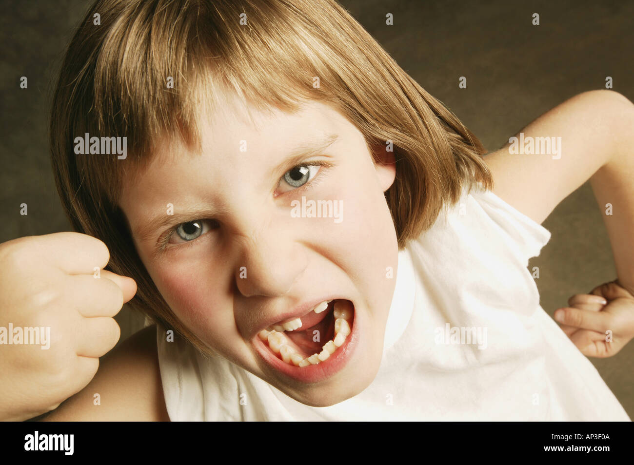 Child with fists Stock Photo - Alamy