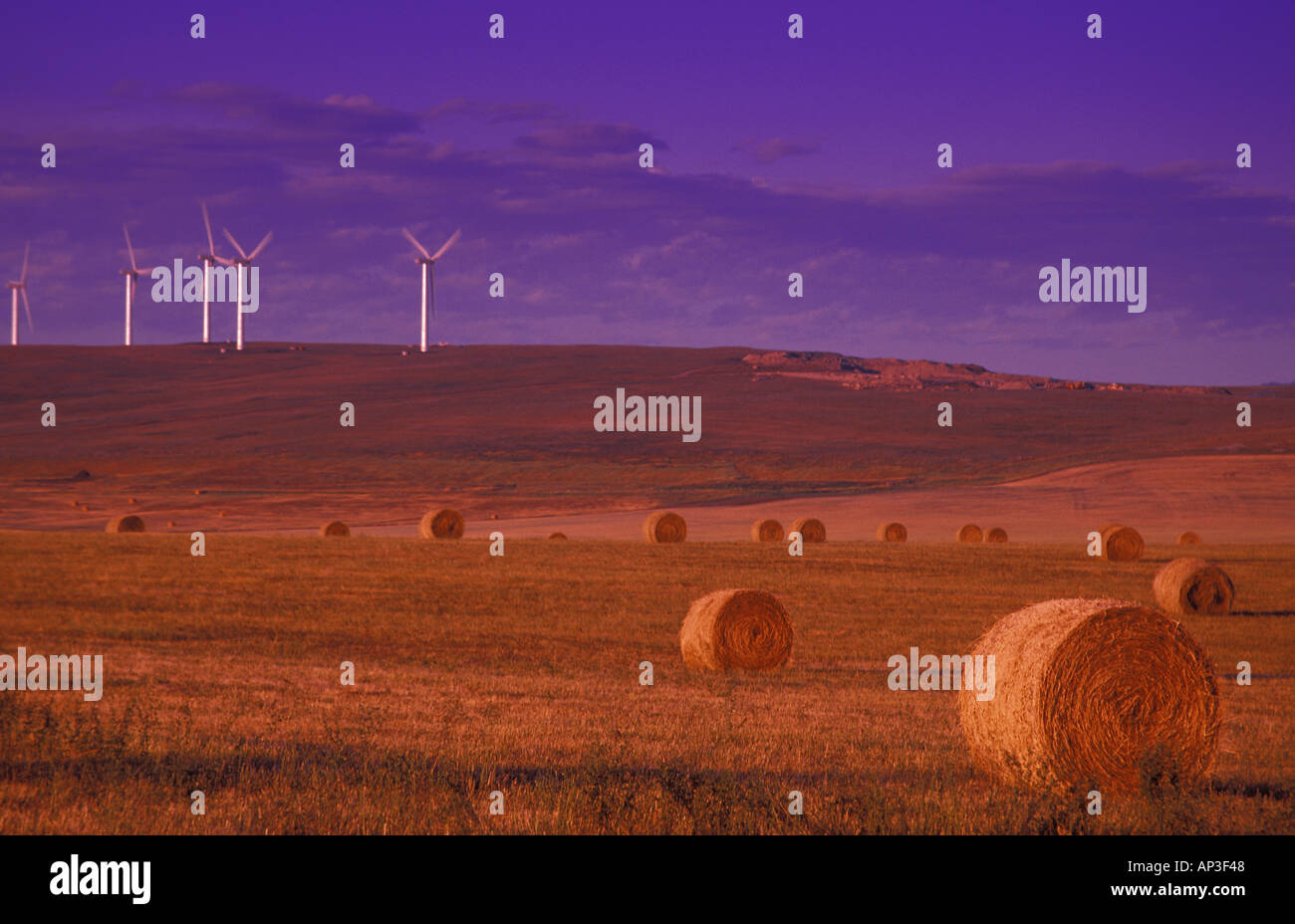 Wind turbines and hay bales Stock Photo - Alamy