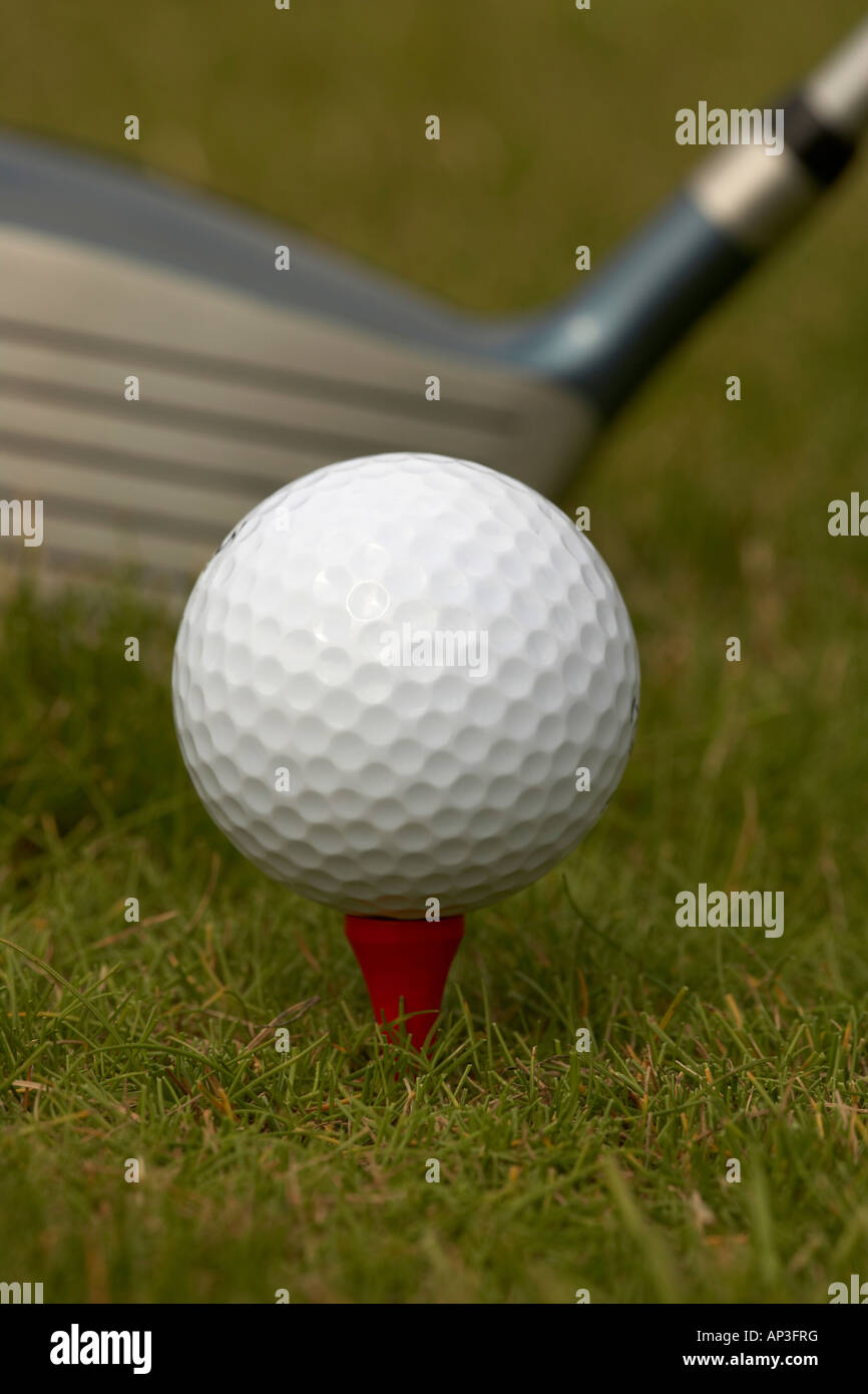 Close up of wood and galf ball on tee Stock Photo - Alamy