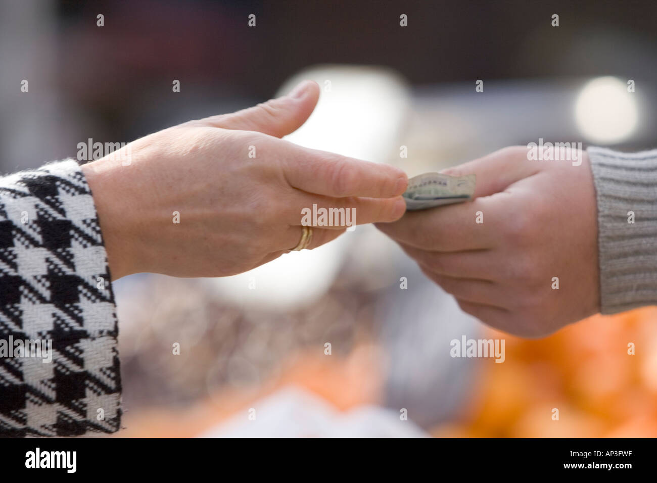 market shopping paying with cash Stock Photo - Alamy