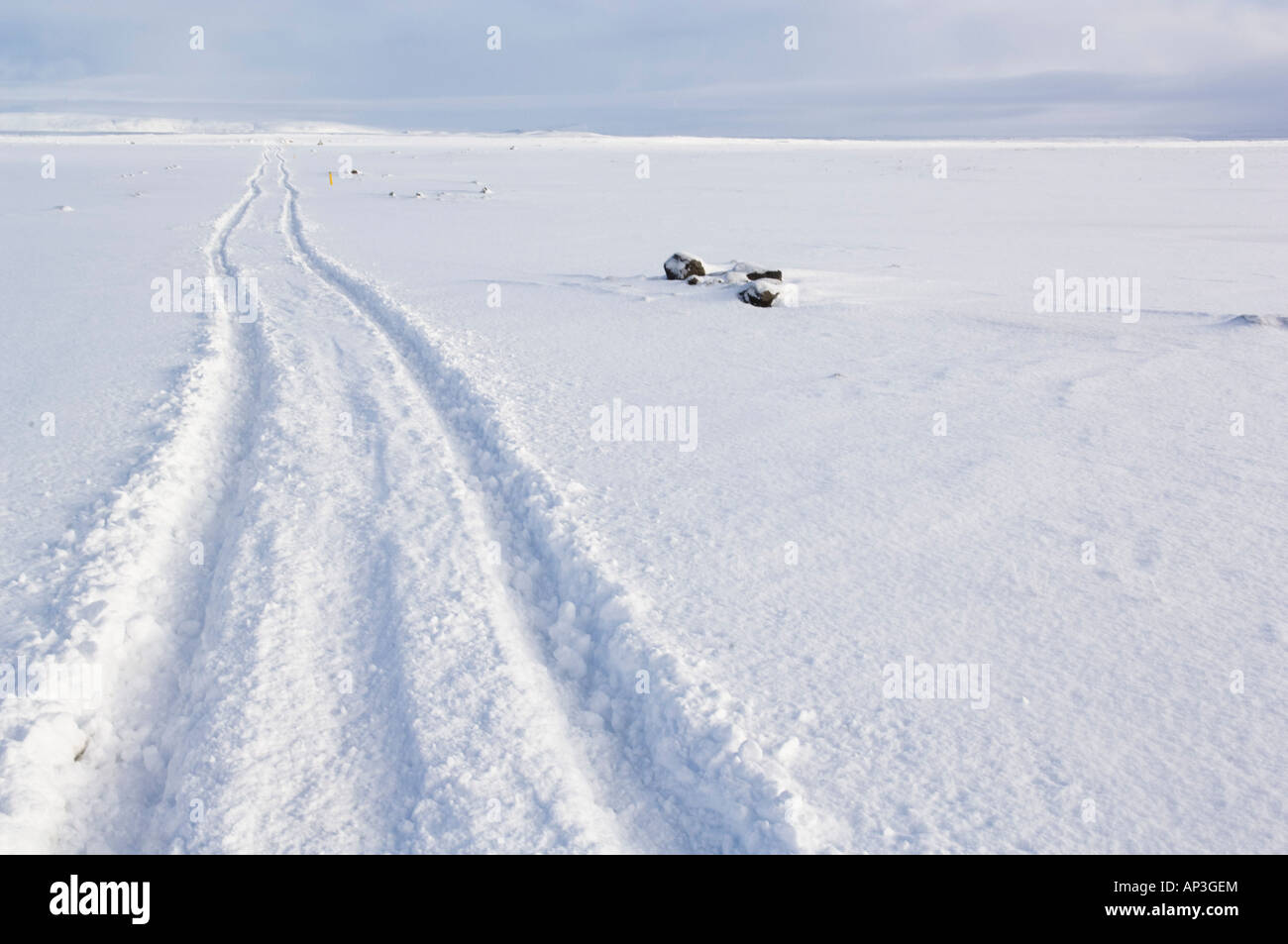 Car tracks in the snow, Iceland Stock Photo - Alamy