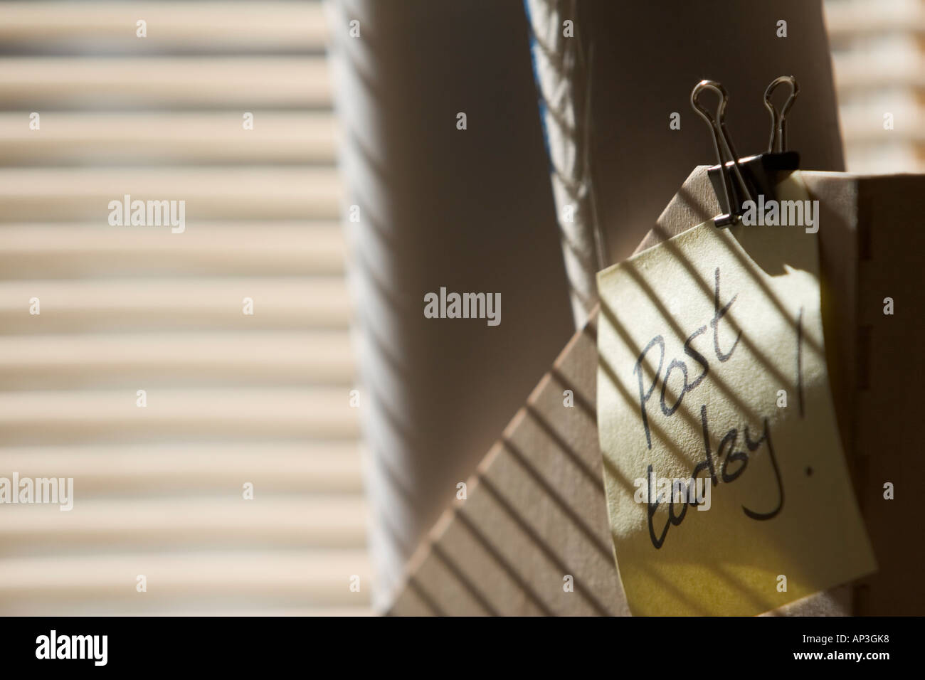 Post Today! message on box of parcel tubes Stock Photo - Alamy