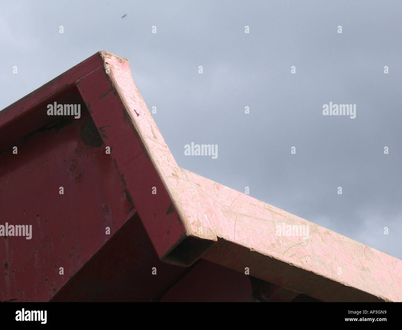 red skip and dark cloudy sky Stock Photo - Alamy
