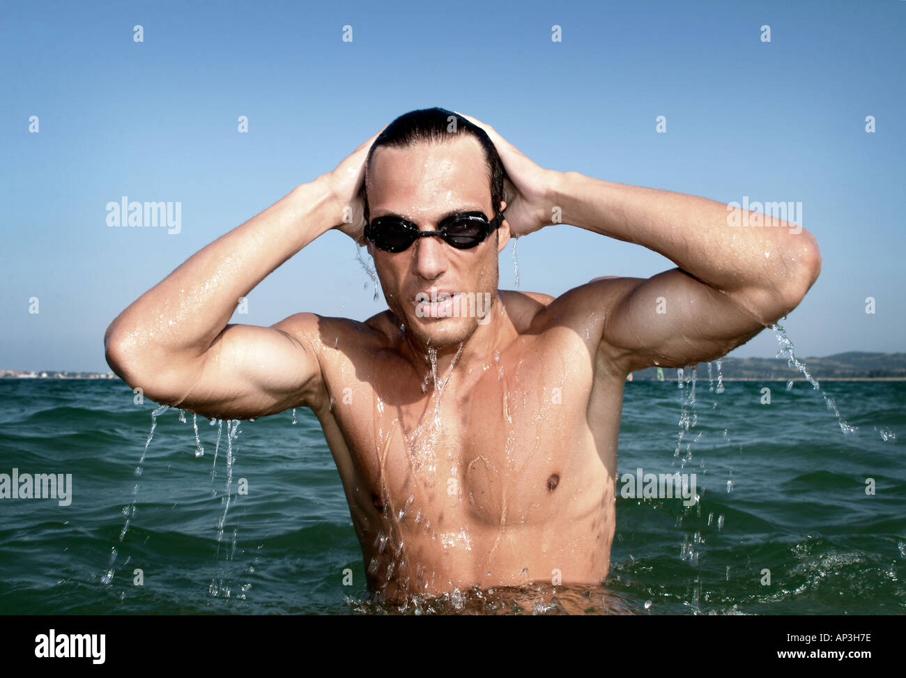 swimmer emerging from the sea Stock Photo - Alamy