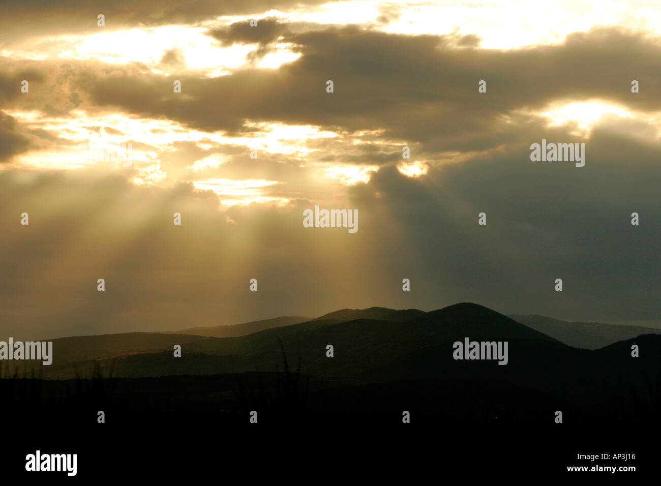 dramatic sunset sunrise sun rays through clouds natural nature scenic sky cloud weather cloudy ...