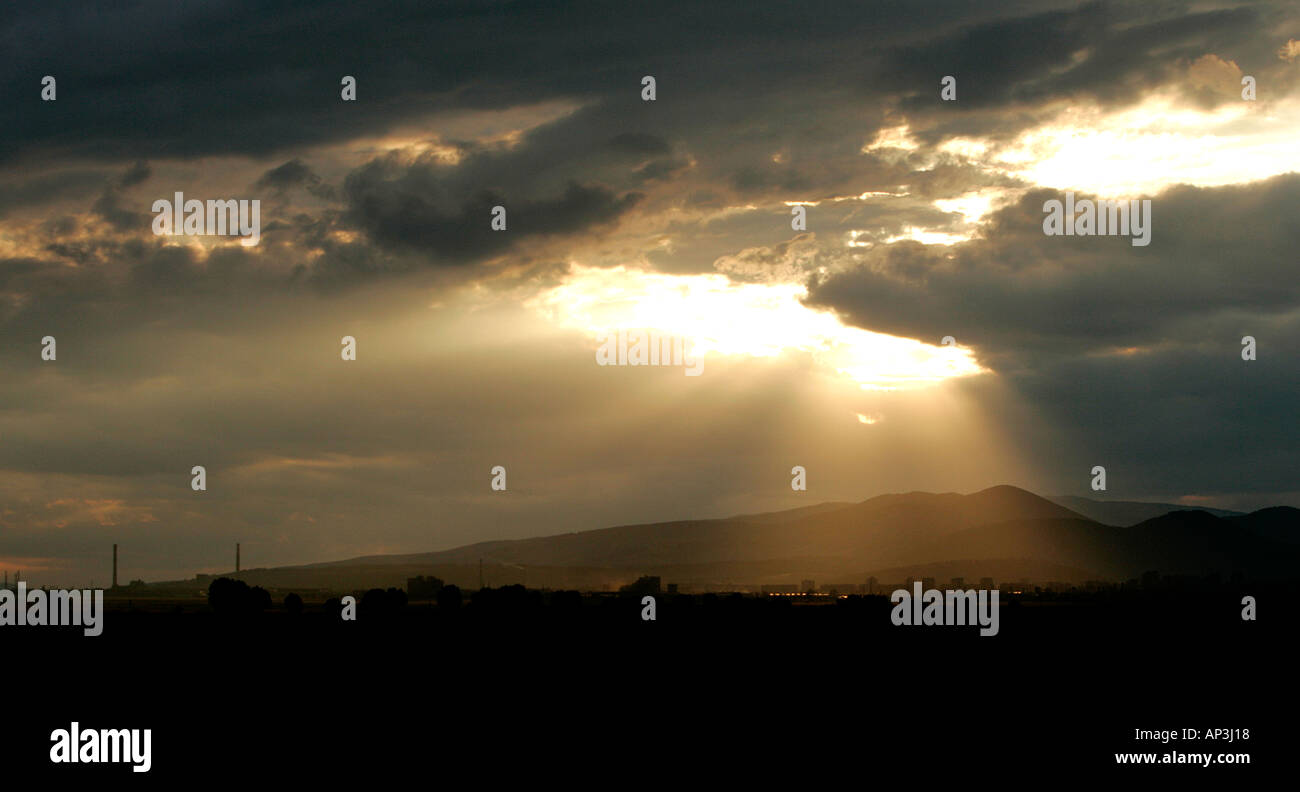 dramatic sunset sunrise sun rays through clouds natural nature scenic sky cloud weather cloudy ...