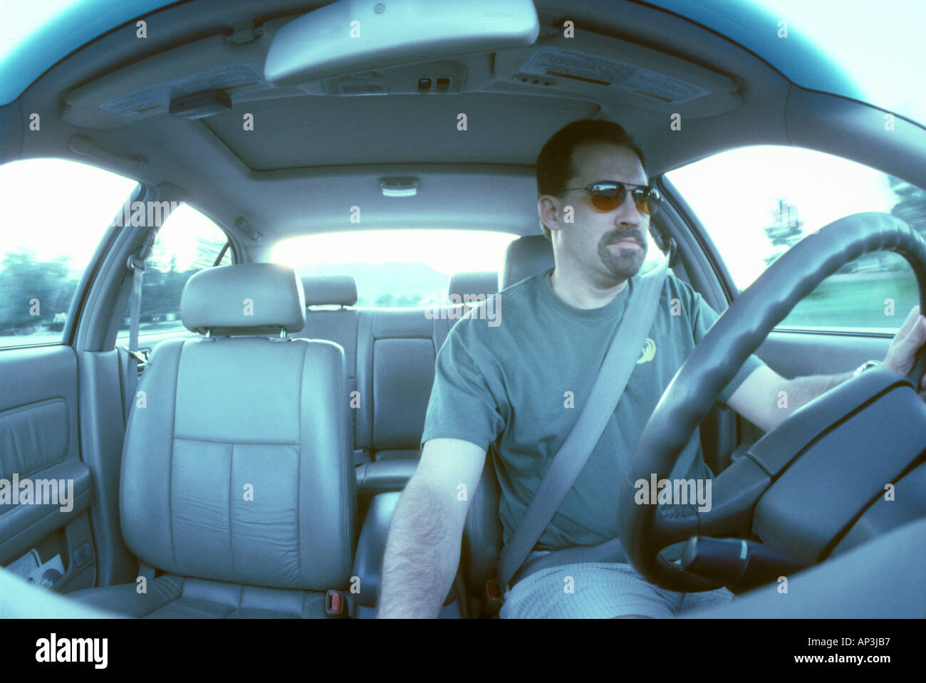 Man driving car Stock Photo - Alamy