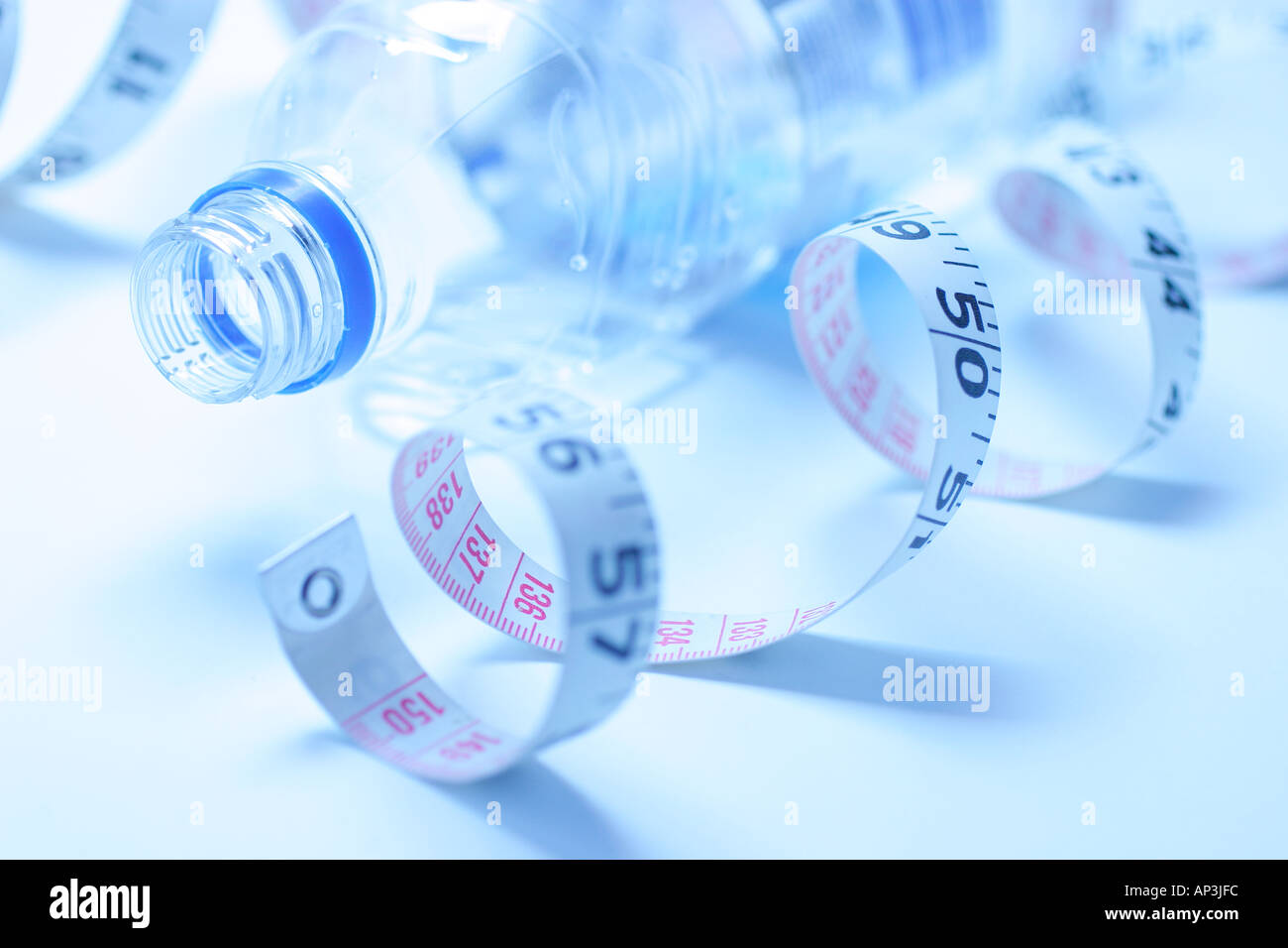 Water Bottle and Tape Measure Stock Photo - Alamy