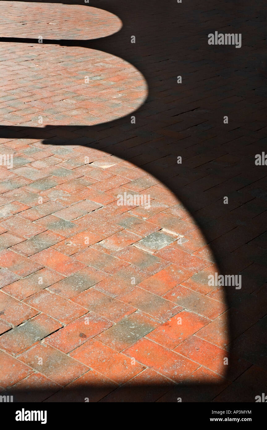 Shadows on a pavement in Rome Italy Stock Photo - Alamy