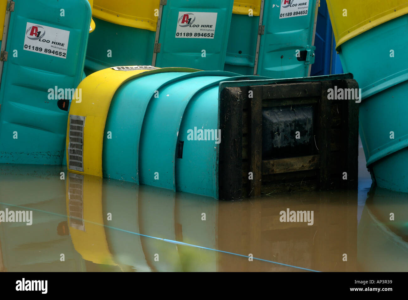 Toilets floating in floodwater, Glastonbury festival 2005 Stock Photo ...