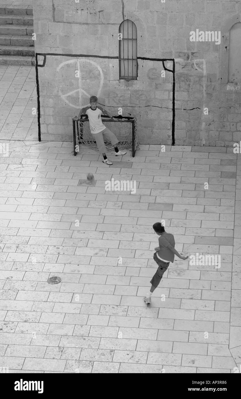 Two Kids playing urban football in Dubrovnik Centre in Croatia Stock ...