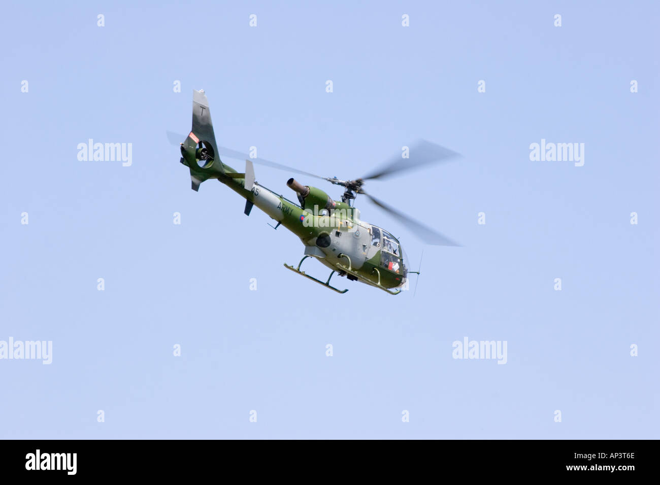 Military helicopter viewed from below as is flies by at height Stock ...