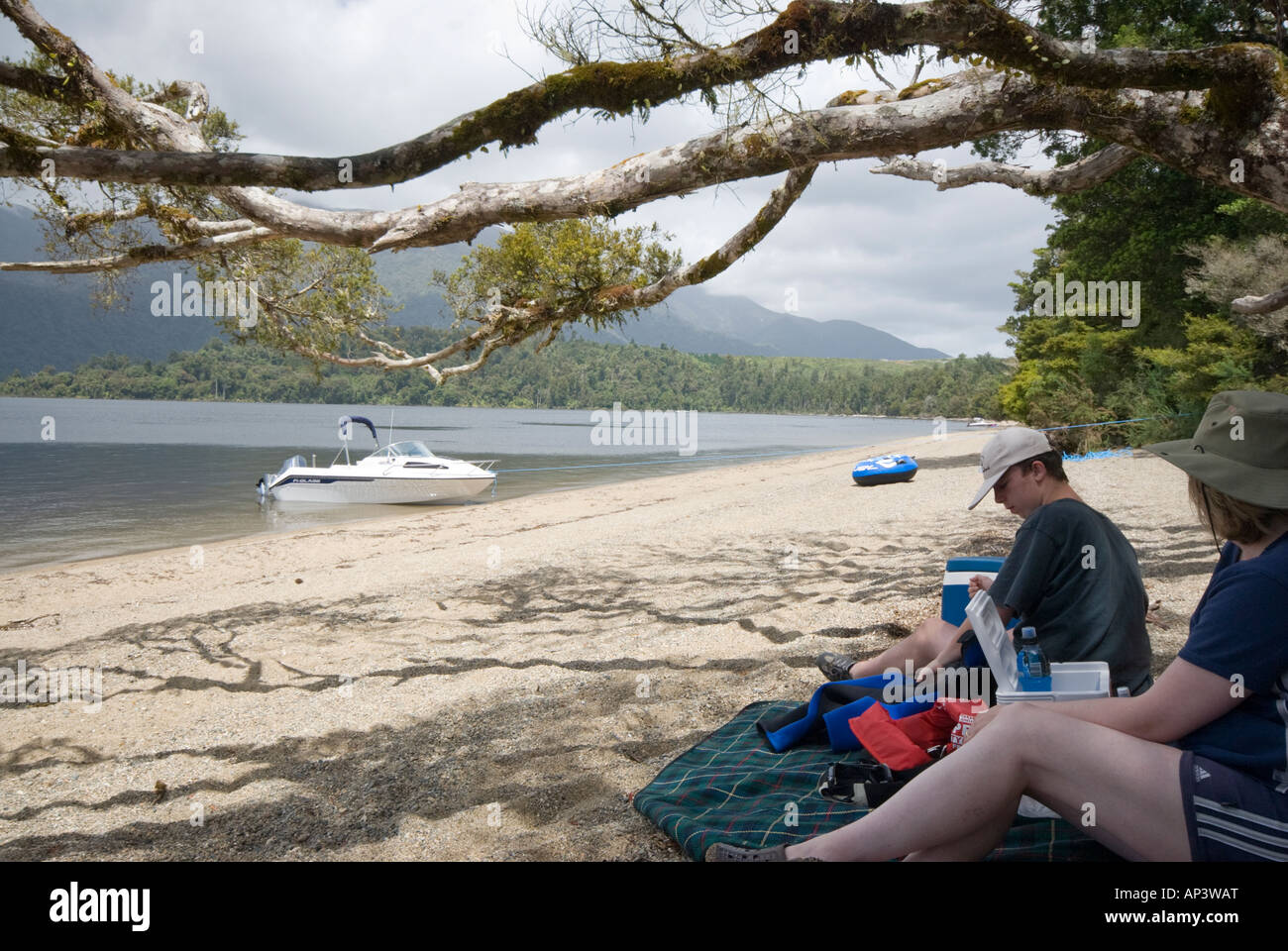 Mother and son picnicking on the shores of Lake Brunner (accessed by ...