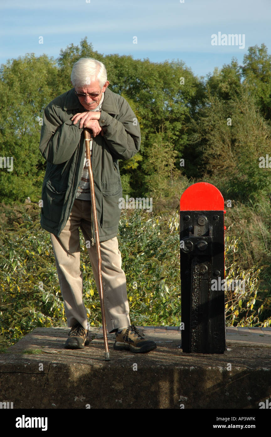 Senior man looking canal hi-res stock photography and images - Alamy