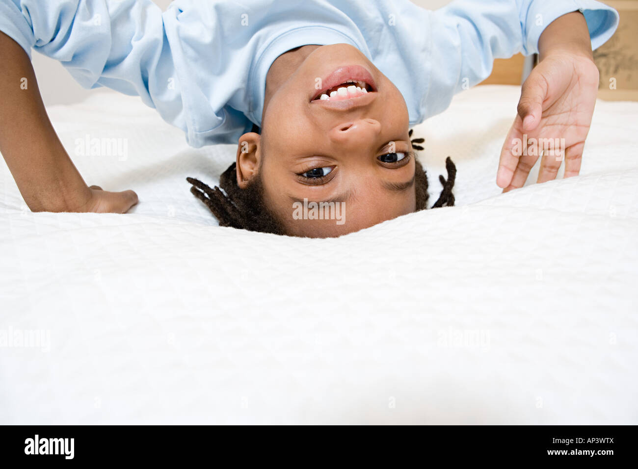 Boy doing a handstand Stock Photo - Alamy