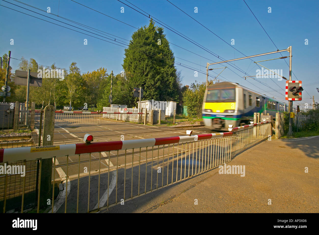 automatic barriers at a road rail crossing Stock Photo - Alamy