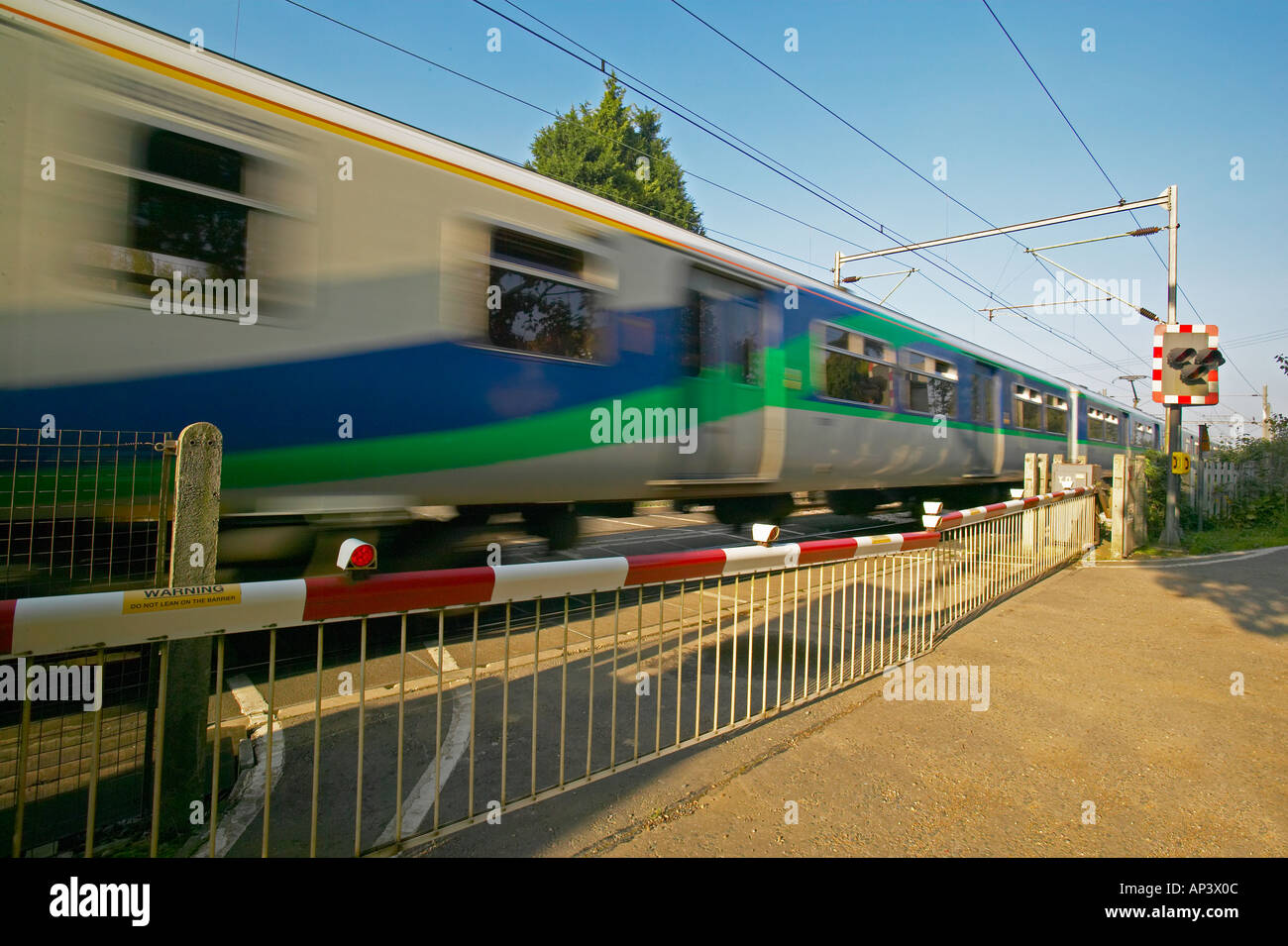 automatic barriers at a road rail crossing Stock Photo - Alamy