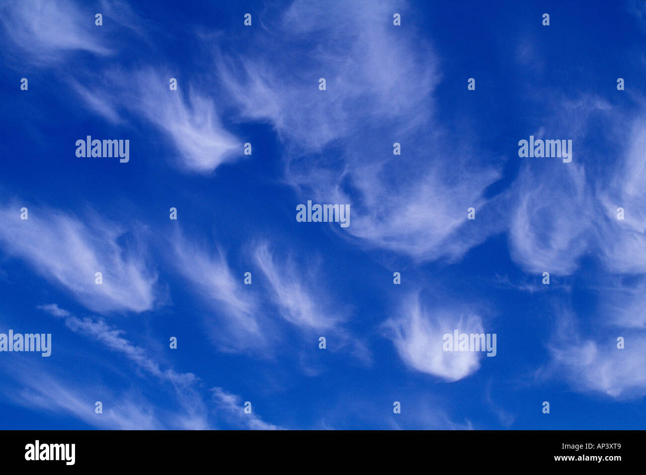 Deep blue sky with scattered cloud hi-res stock photography and images ...