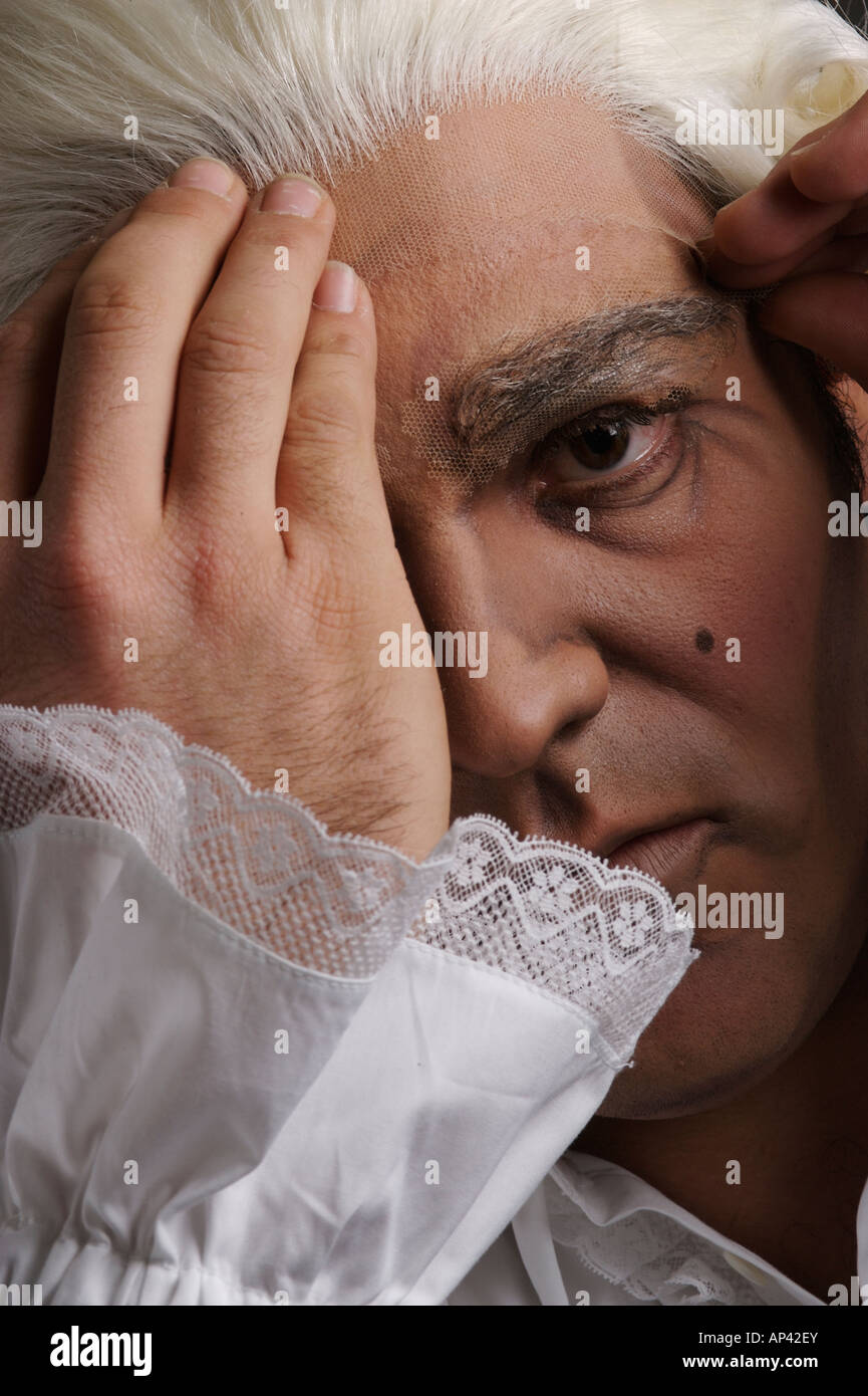 Singer adjusts wig before going on stage Stock Photo - Alamy
