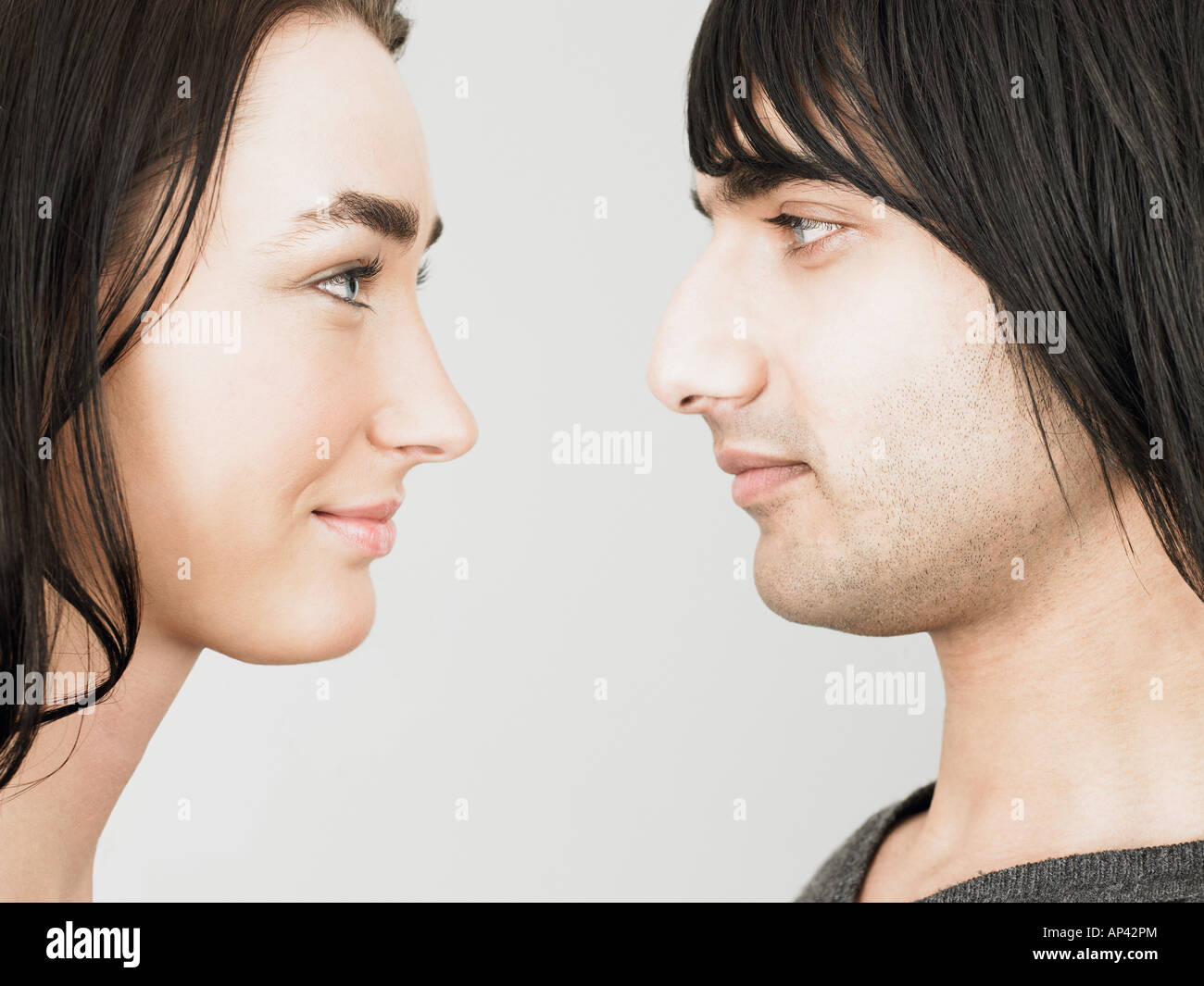 Couple face to face Stock Photo - Alamy
