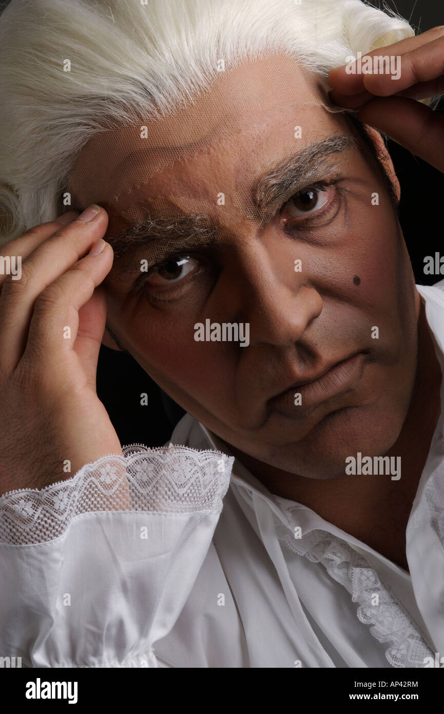 Singer adjusts wig before going on stage Stock Photo - Alamy