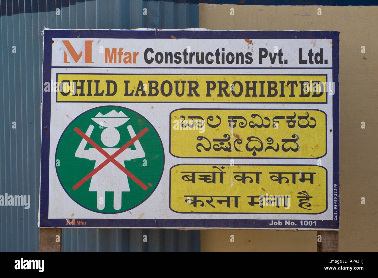 A sign emphasises that child labour is prohibited in English and ...