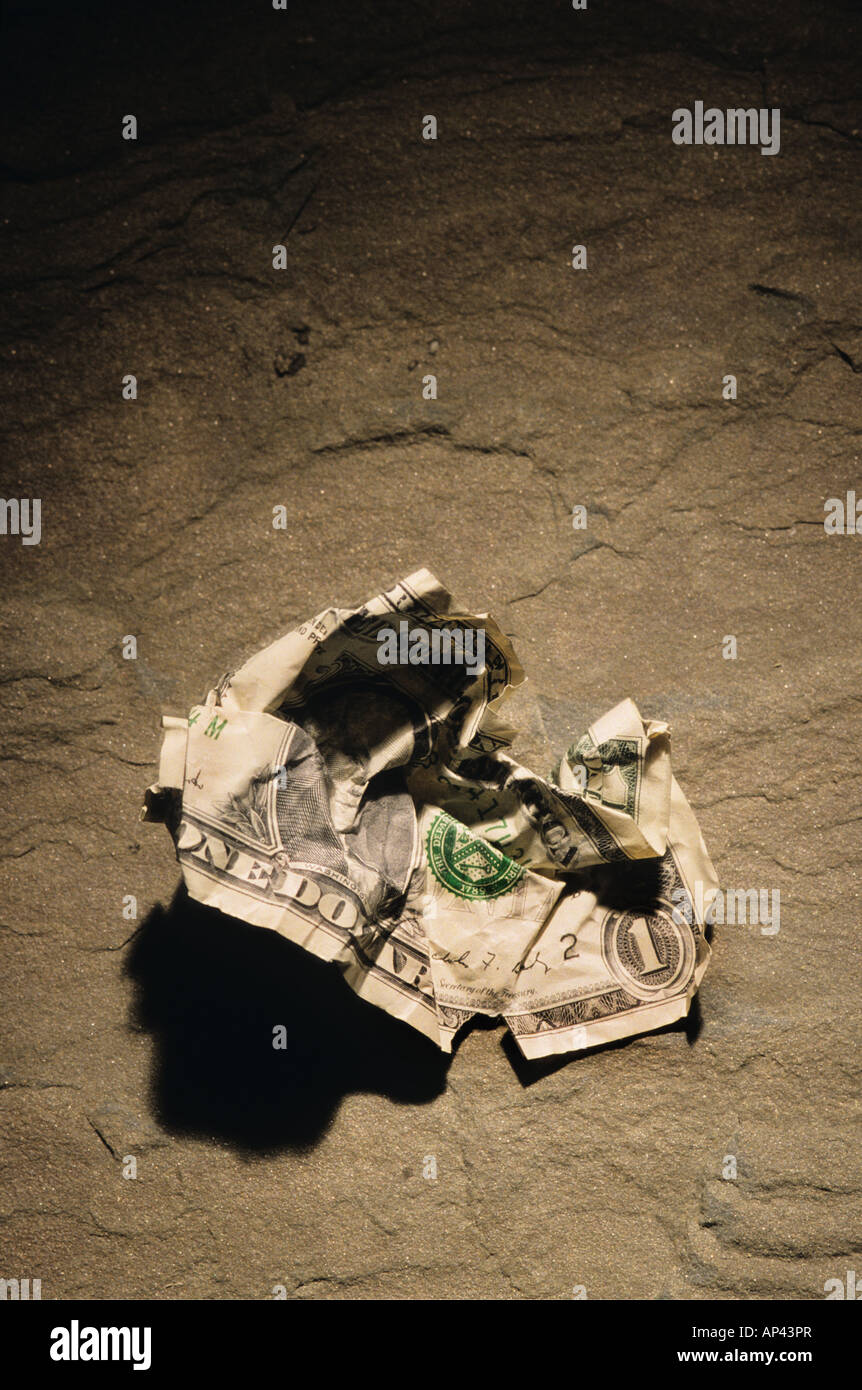 Crumpled up one dollar bill Stock Photo - Alamy