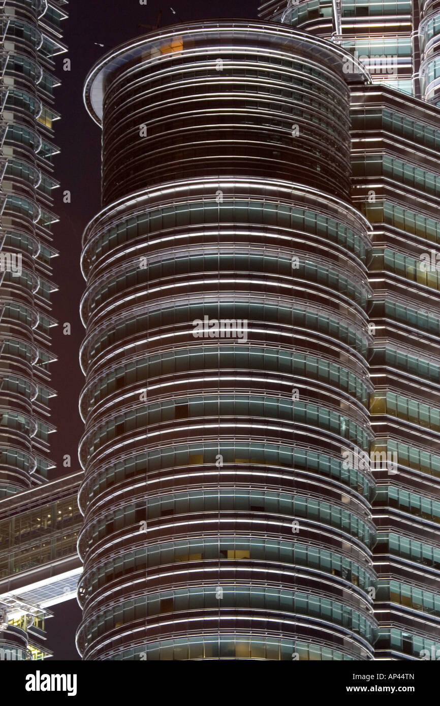A detail from the facade of one of the Petronas Towers at night Stock ...