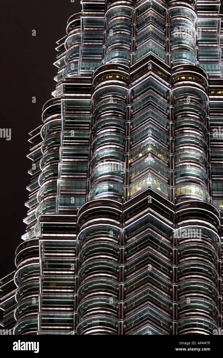 A detail from the facade of one of the Petronas Towers at night Stock ...